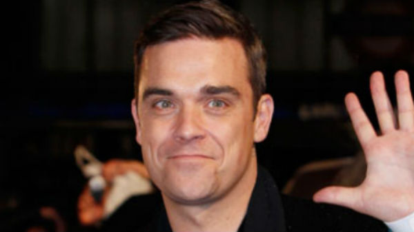 O maimuță va interpreta rolul lui Robbie Williams în filmul despre viața sa